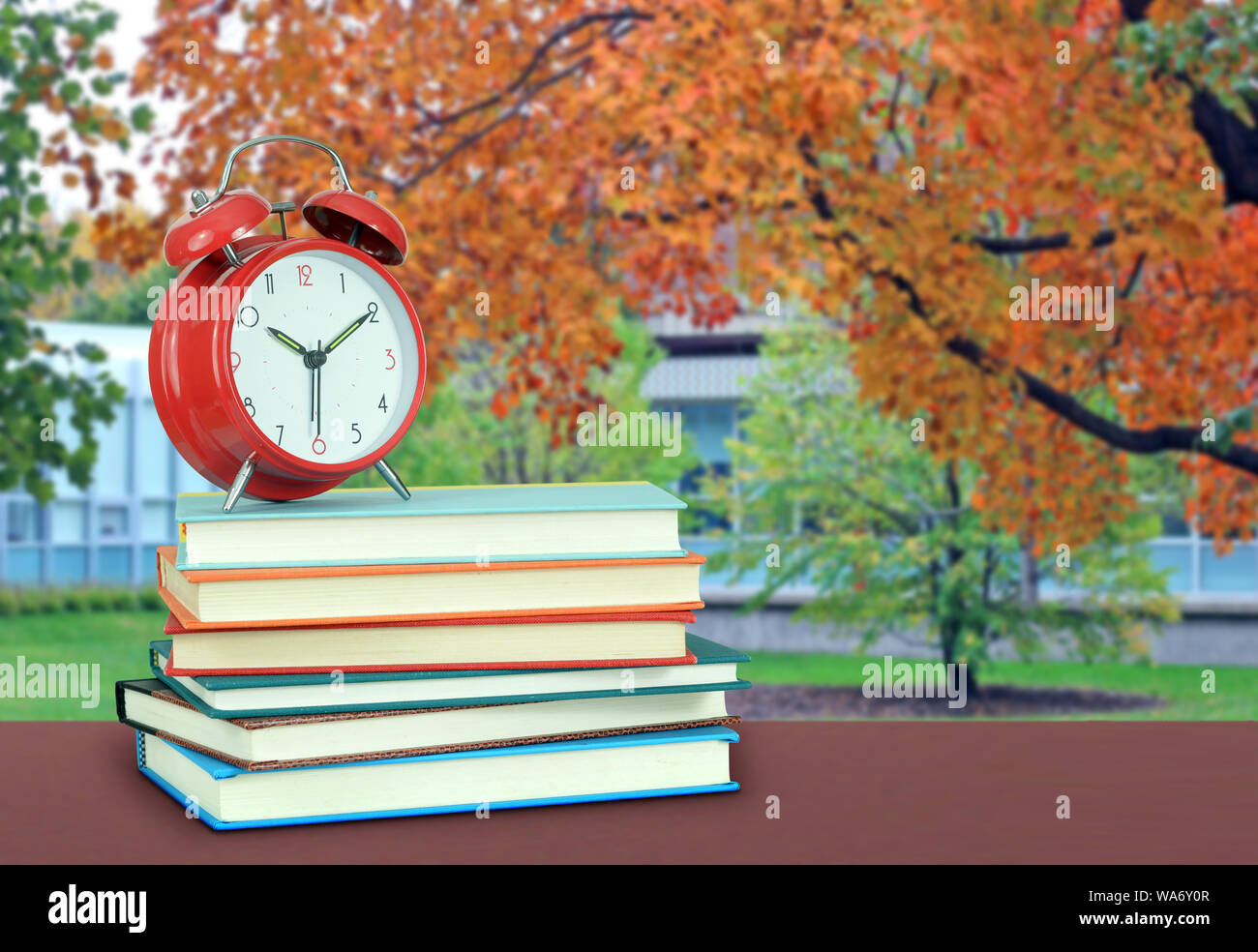 blurry background of university campus in Fall season and book for ...