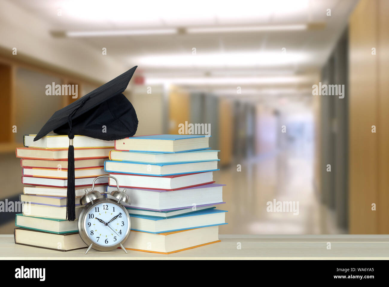 very blurry school hall background and book for education concept Stock ...