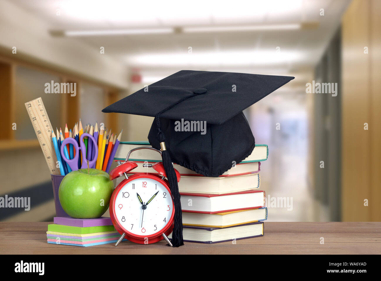very blurry school hall background and book for education concept Stock ...