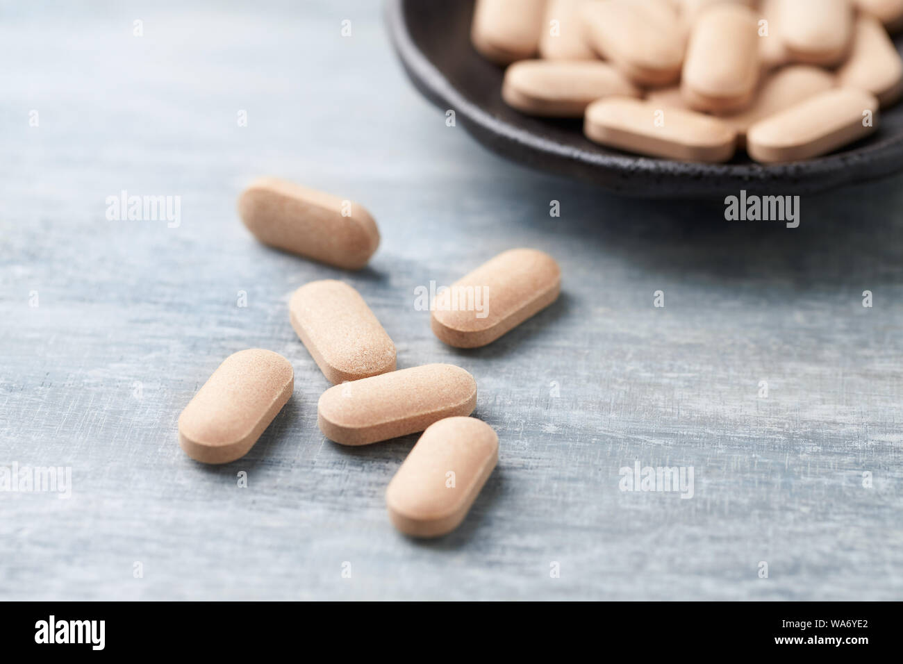 Rhodiola rosea. Golden root, rose root. Herbal pills with healthy ...