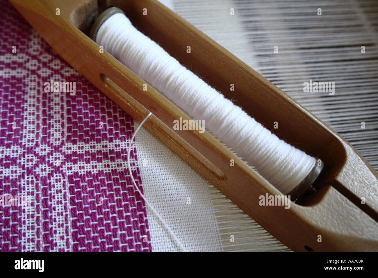Weaving shuttle hi-res stock photography and images - Alamy