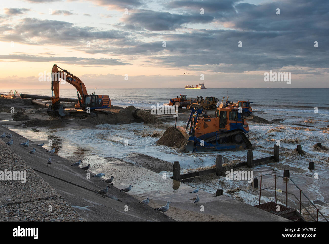 Sand sculpture works, Walcott, Norfolk, East Anglia, UK Stock Photo - Alamy
