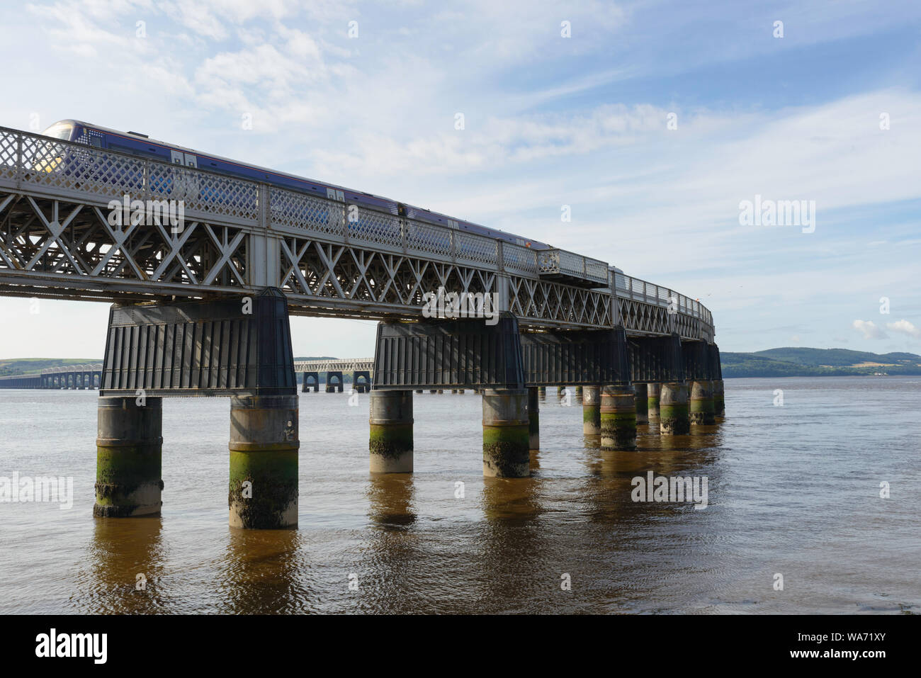 ScotRail train passes over the Tay Rail Bridge Dundee Tayside Scotland ...