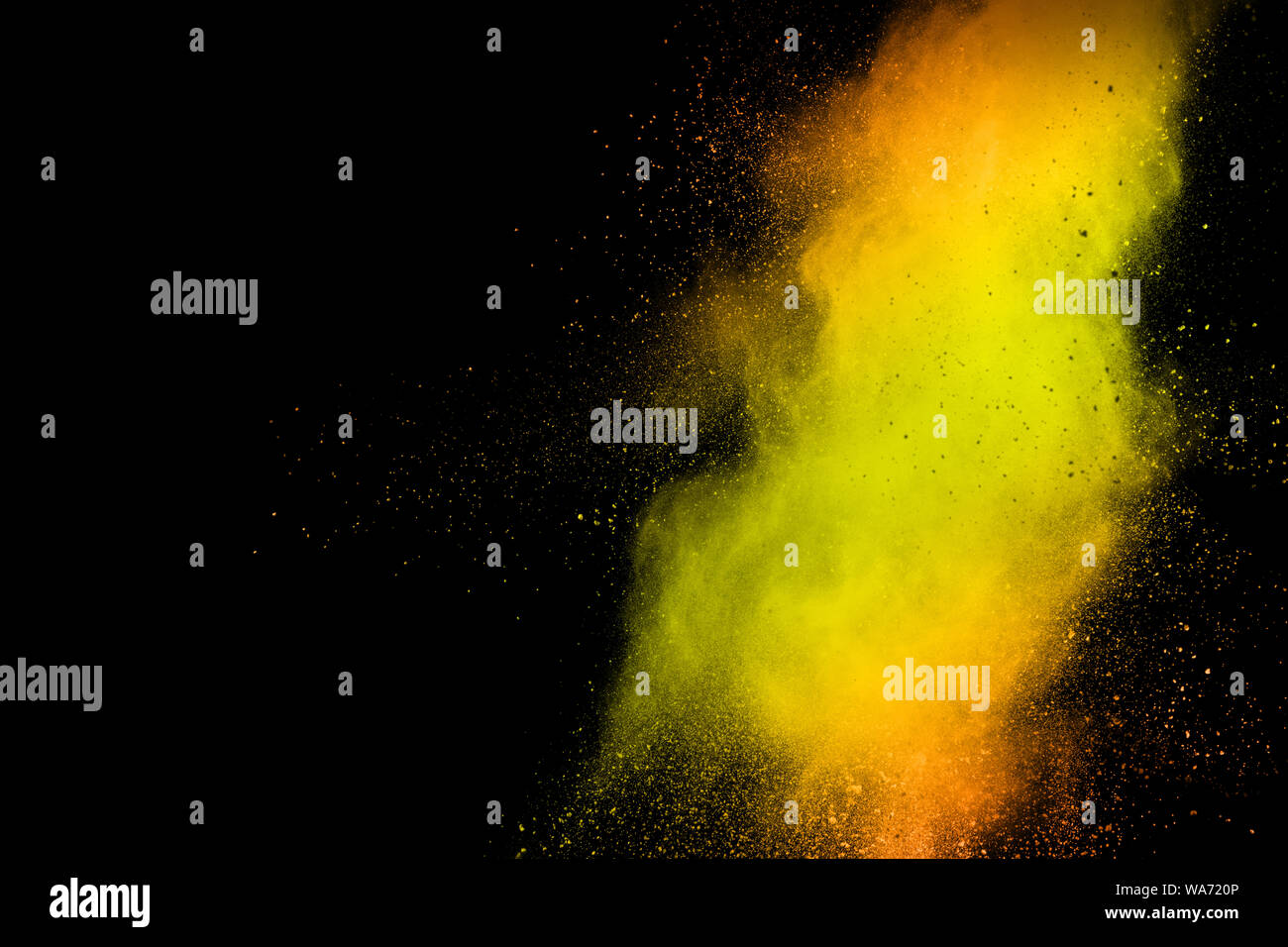 Abstract explosion of orange dust on white background Stock Photo - Alamy