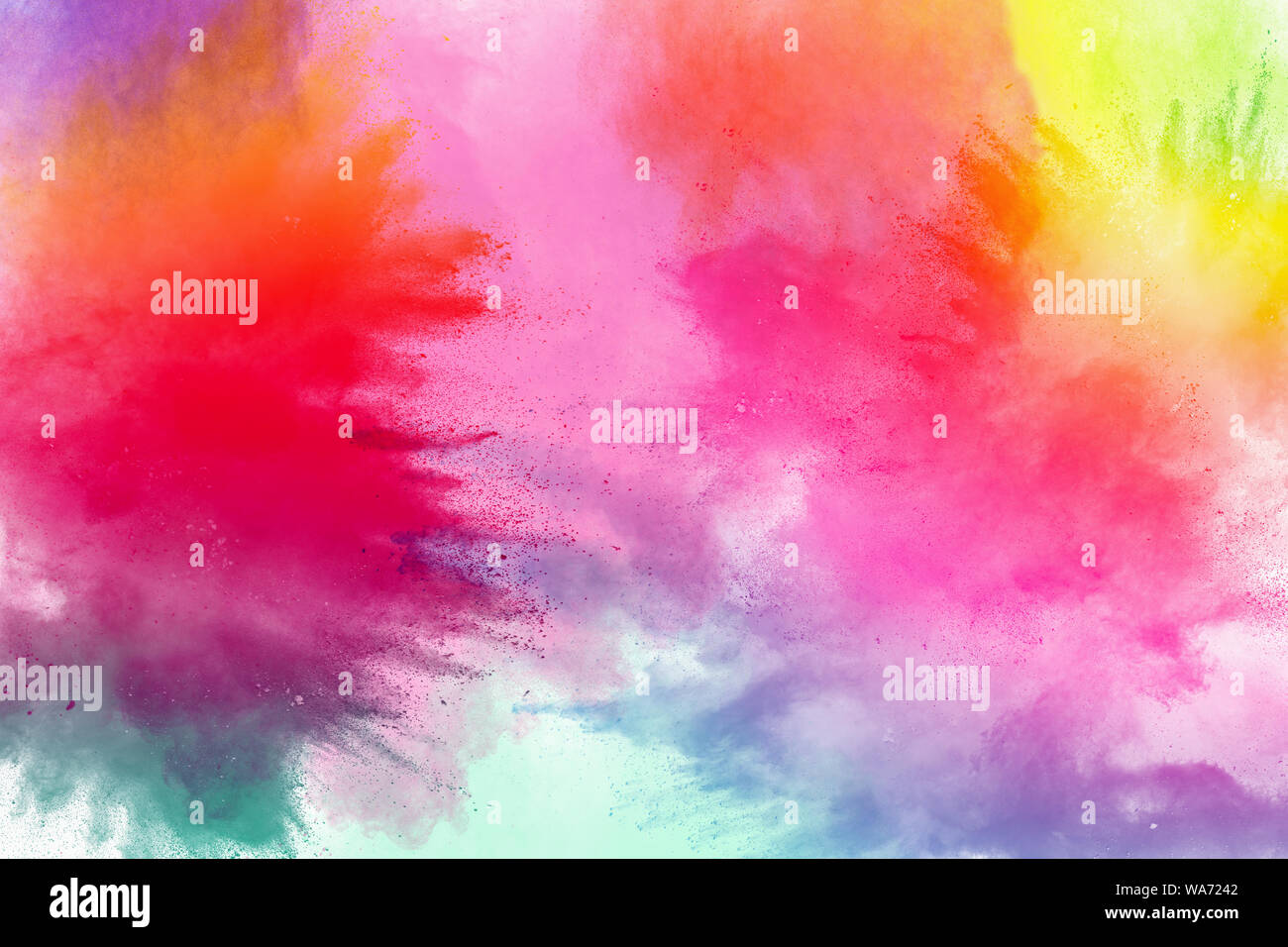 Freeze motion of colored powder explosions isolated on white background ...