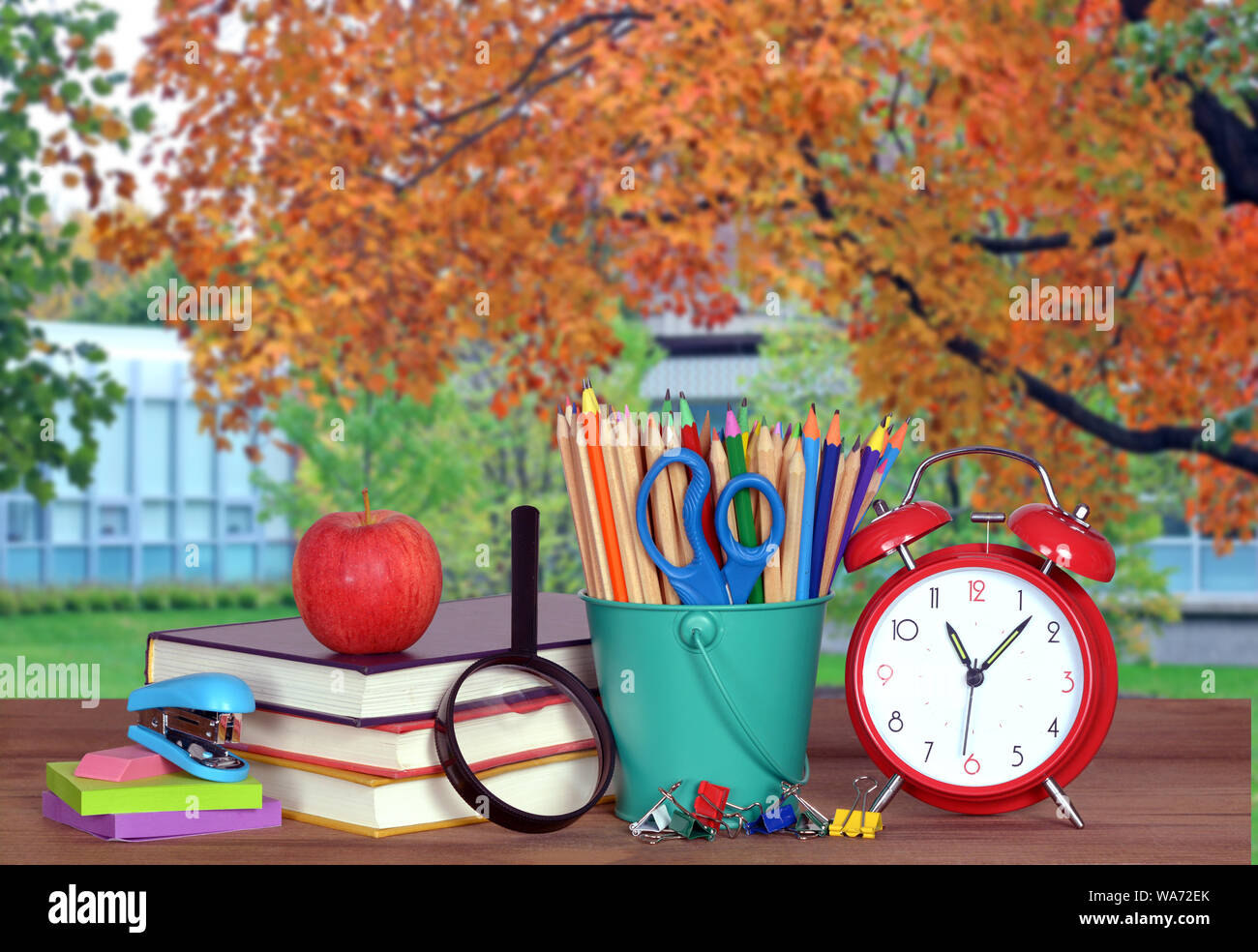 blurry background of university campus in Fall season and book for ...