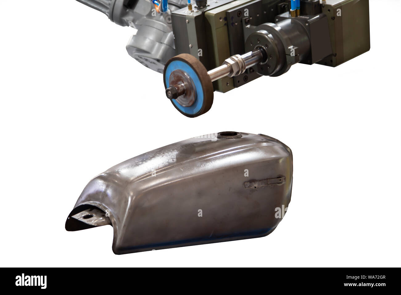 Robotic arm grinding motorcycle tank in motorcycle assembly factory ...