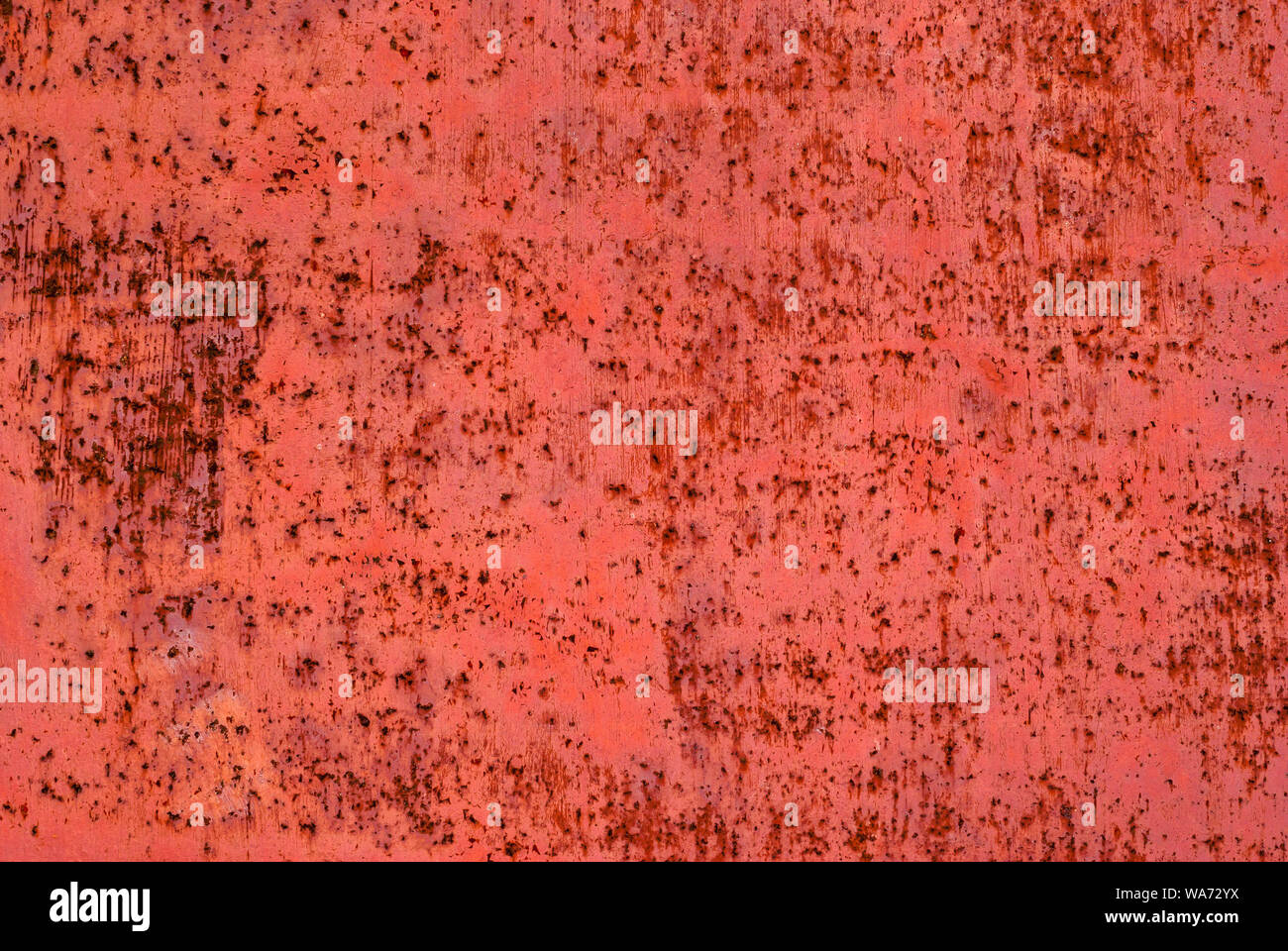 background texture - red old primed metal surface with rust stains ...