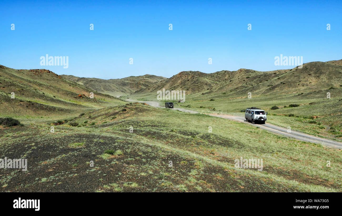 Russian Vans driving on a secluded road, Mongolia Stock Photo - Alamy