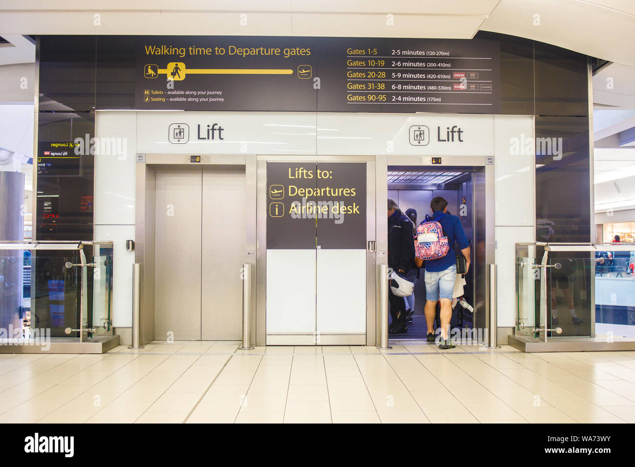 Passengers Going Into Lift at Gatwick Airport Stock Photo - Alamy