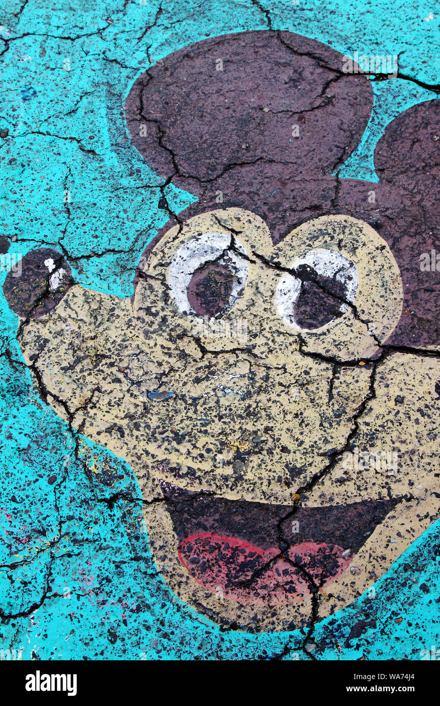 Decomposing children's drawings on asphalt Stock Photo - Alamy