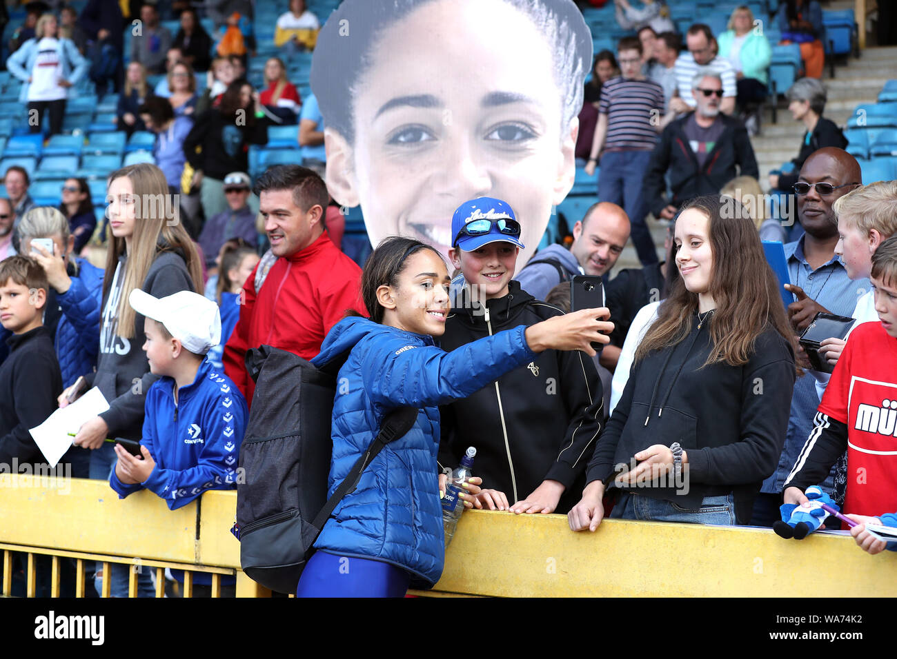 Great Britain's Katarina Johnson-Thompson takes a selfie with fans ...