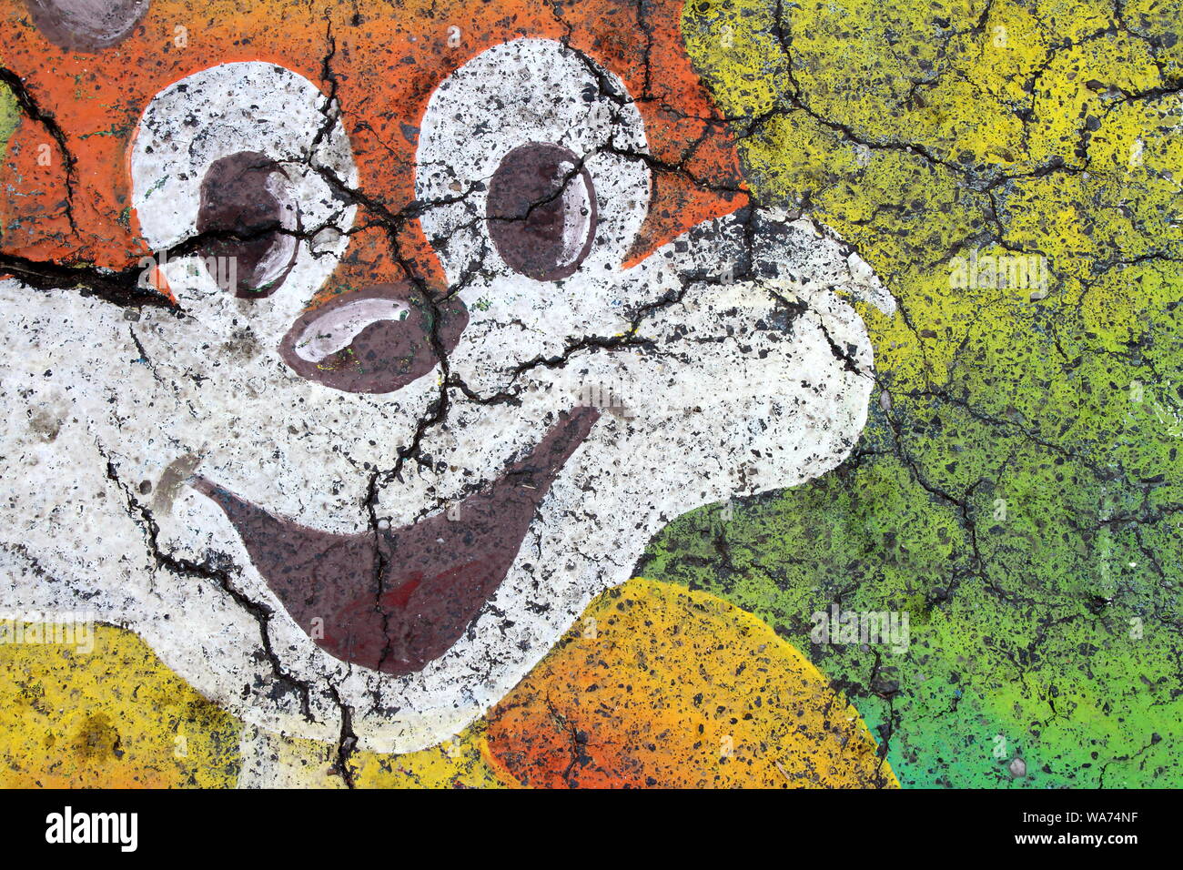 Decomposing children's drawings on asphalt Stock Photo - Alamy