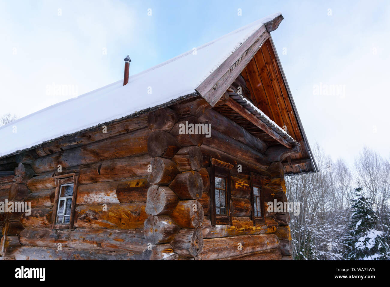 old log Russian peasant hut izba against winter sky Stock Photo - Alamy