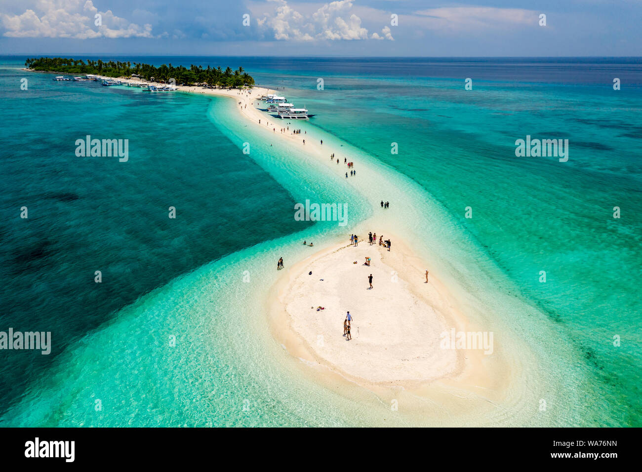 Aerial drone view of a beautiful tropical island with sandy beach ...