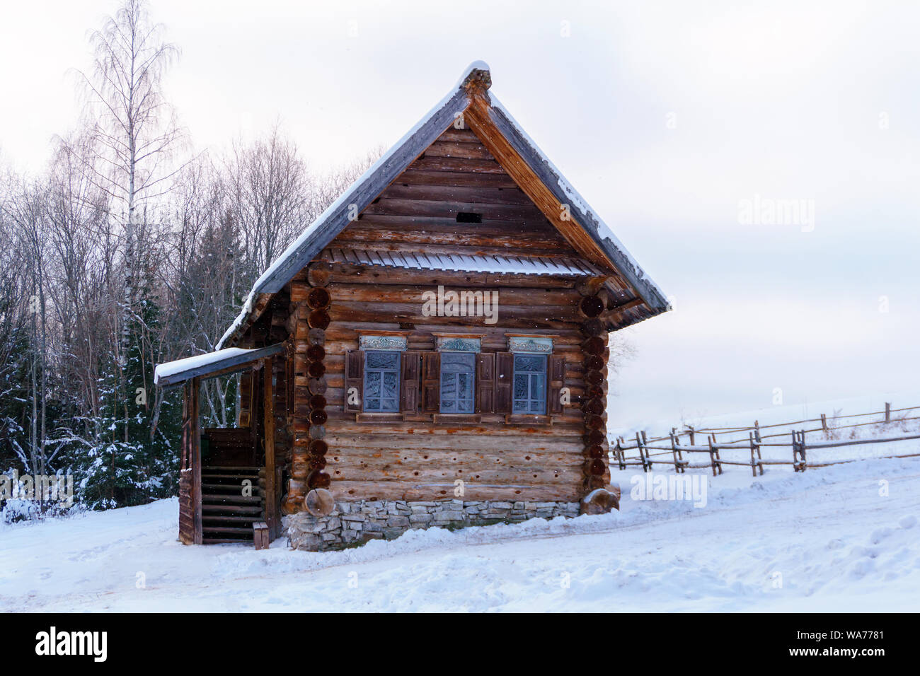 old log Russian peasant hut izba in the winter landscape Stock Photo ...