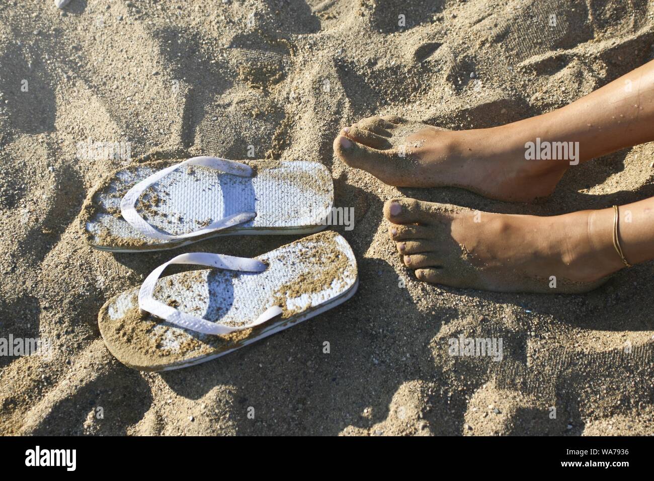 Running flip flops hi-res stock photography and images - Alamy