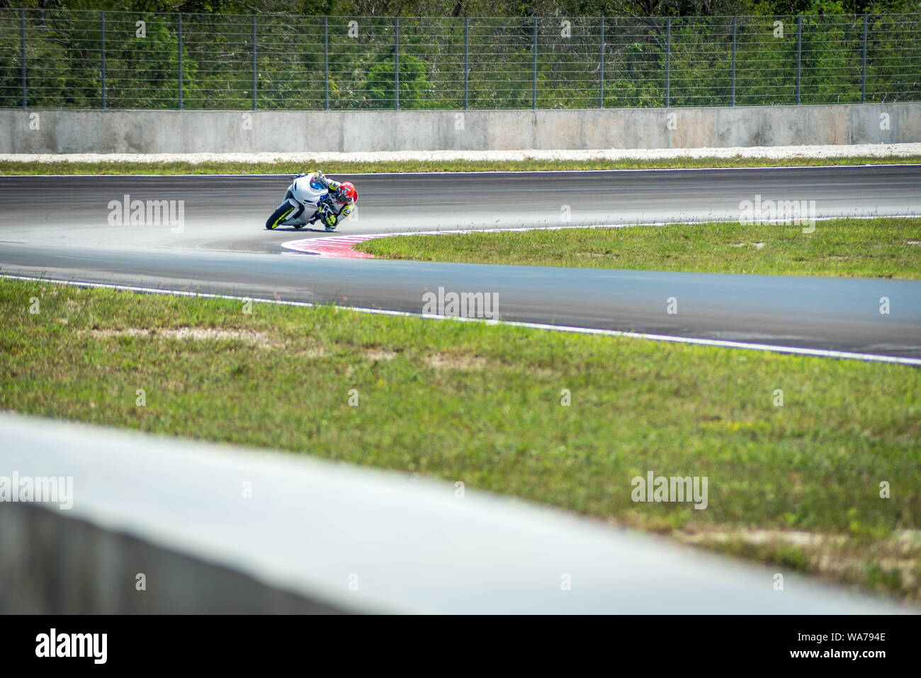 HIGH SPEED MOTORBIKE TAKING A CURVE Stock Photo - Alamy