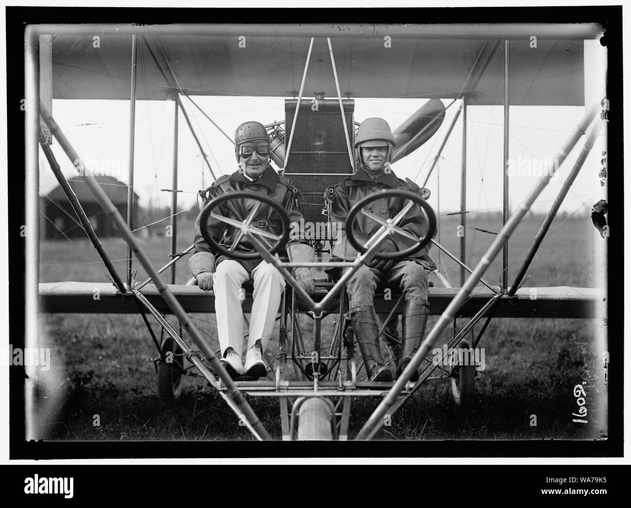 AVIATION, NAVY. COMMODORE J.C. GILLMORE IN CURTISS HEADLESS PLANE, DUAL ...