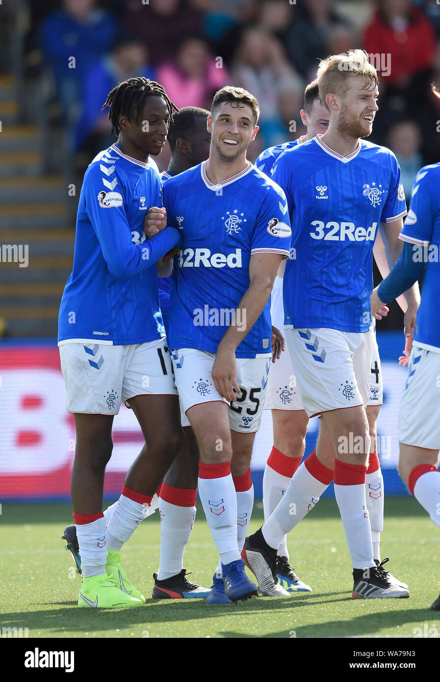 Rangers Joe Aribo (left) celebrates scoring his side's third goal of ...
