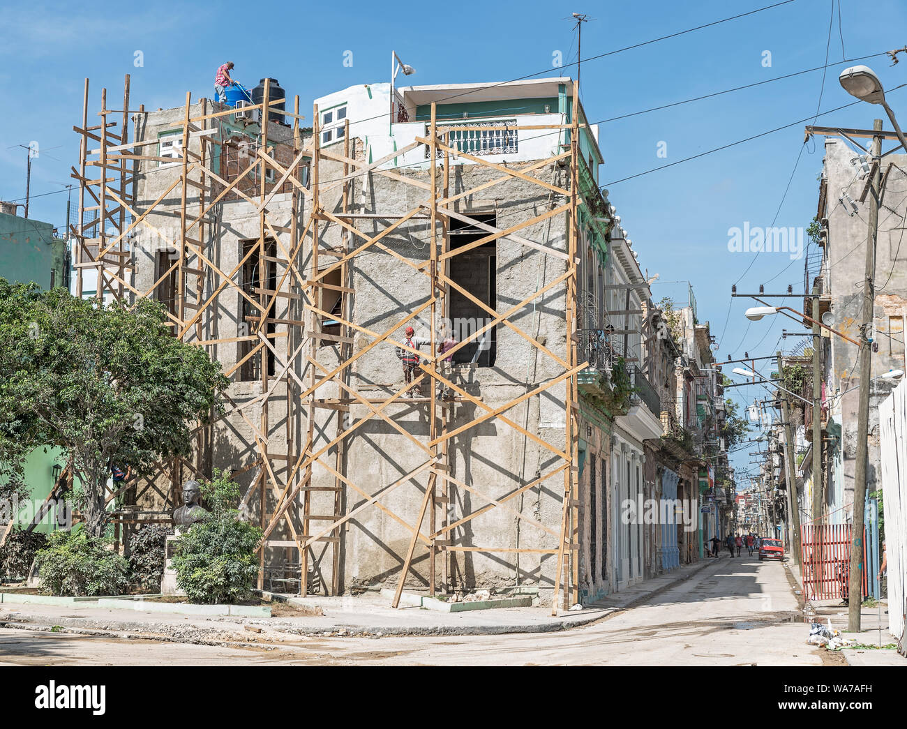 Havana, cuba - April 08, 2019: workers and a scaffold do repair work to ...