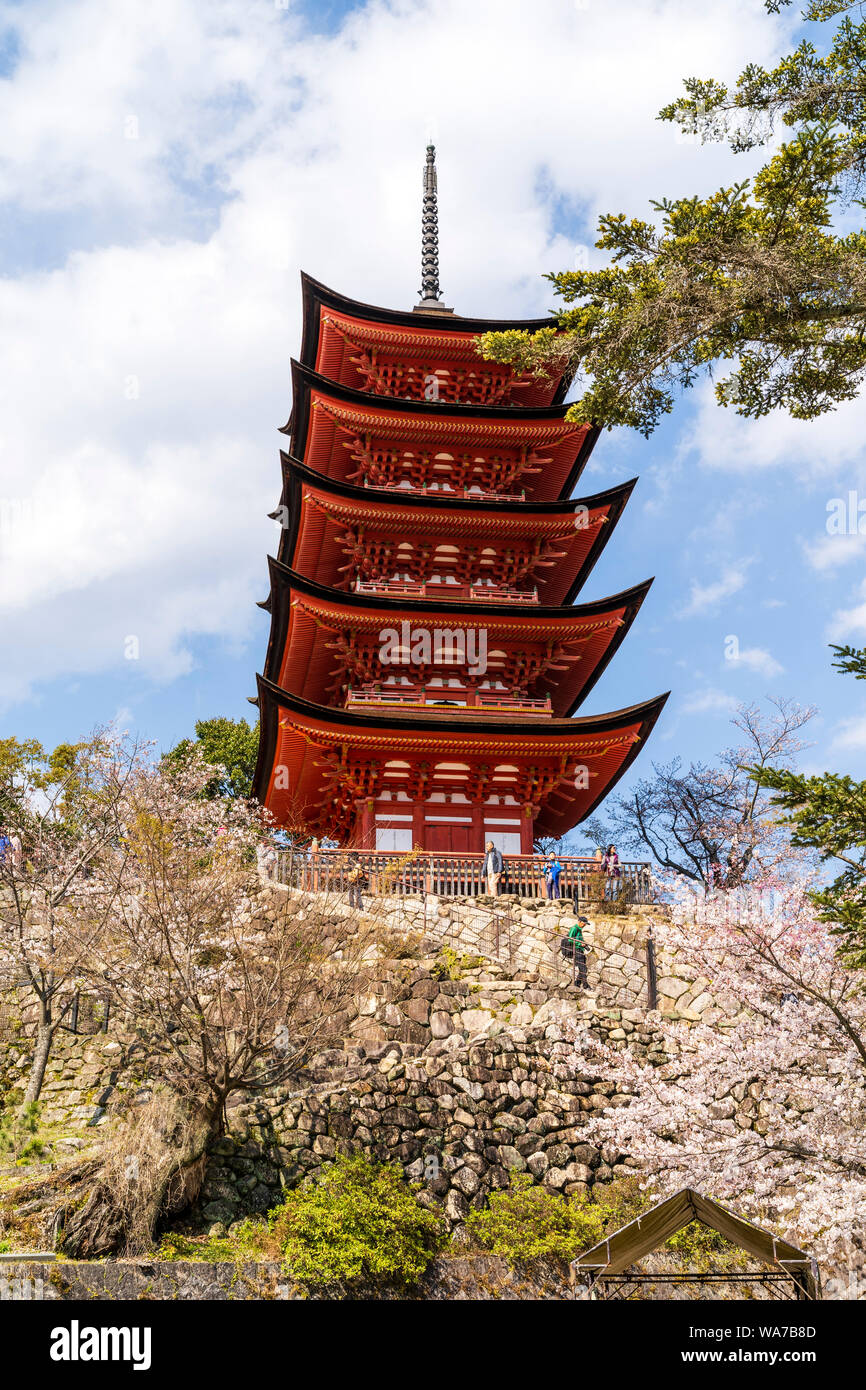 Japan, Miyajima Island. The Japanese style red Five storied pagoda ...