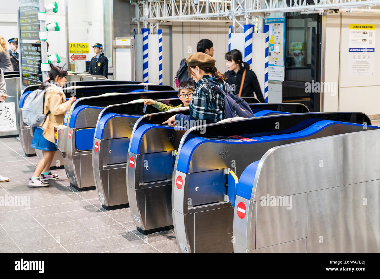 Japan, Hiroshima station interior. Gate to shinkansen platforms with ...