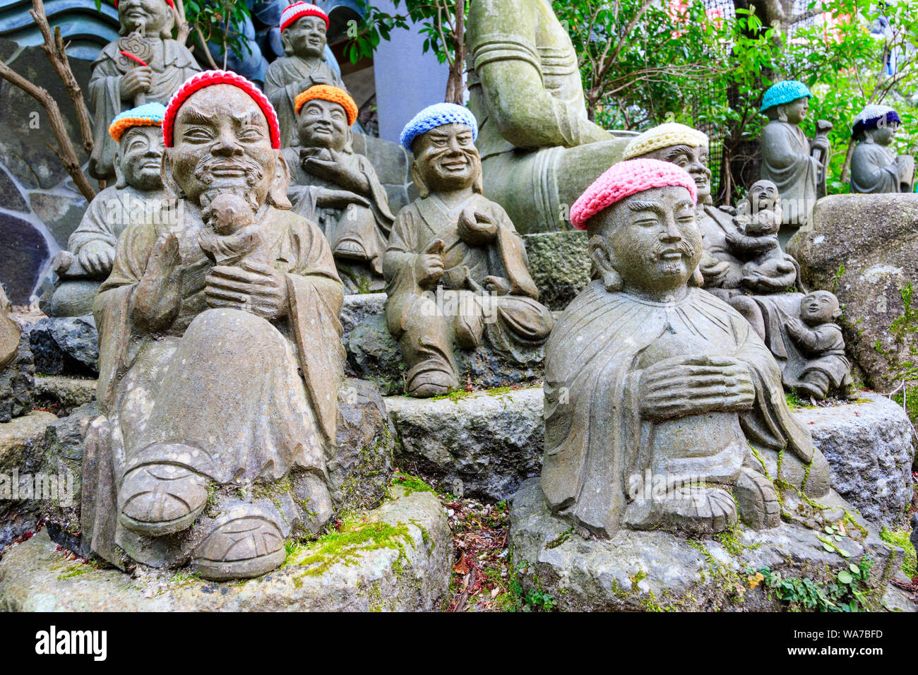 Japan, Miyajima. Small Rakan statues of Buddhist monks, disciples of ...