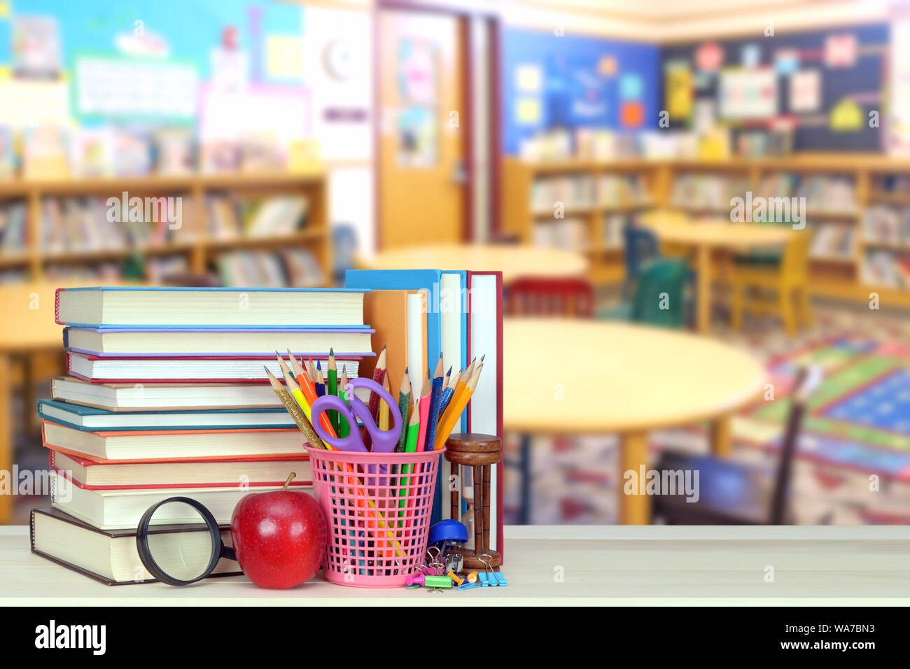 a modern classroom as very blurry background for education concept ...