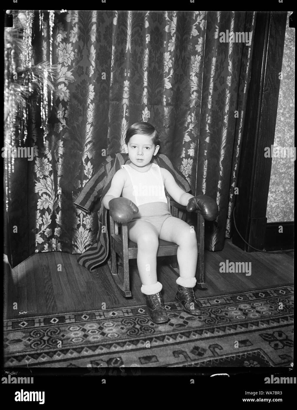 An embryo fighter. Little Joseph B. Bovello, Jr., 3 years of age, is ...