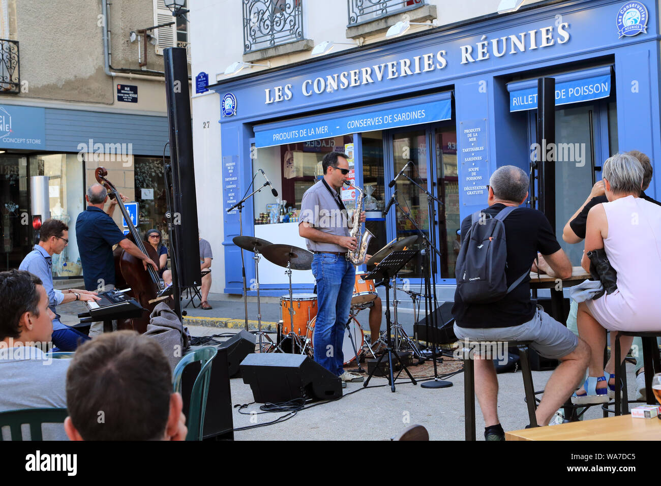 Jazz band as part of Jazz en Ville 2019 playing outside café with ...