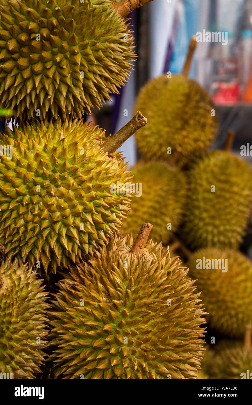 Stack of durians fruit at the market Stock Photo - Alamy