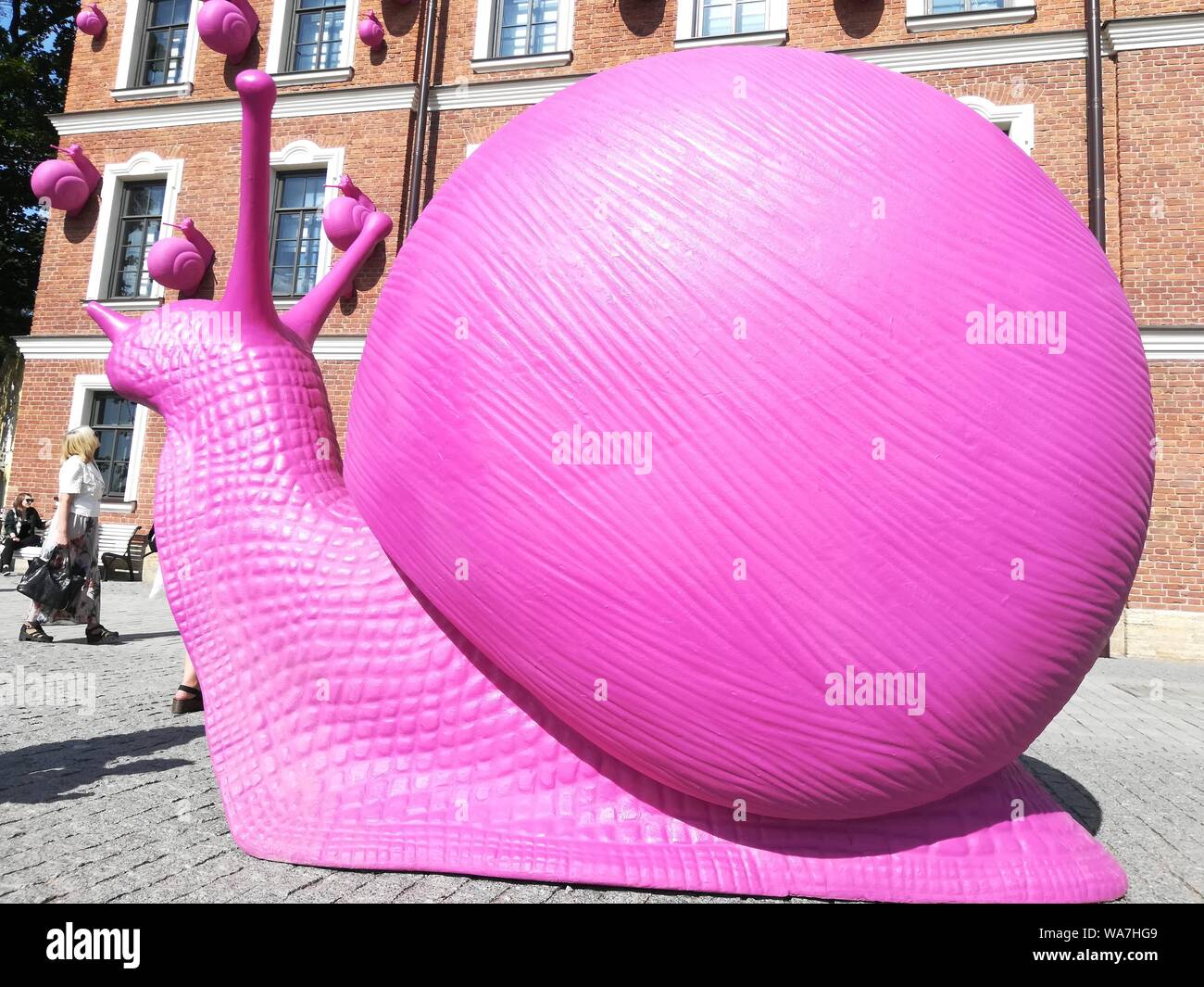 Pink snails installation, made from recycled plastic by eco-activists ...