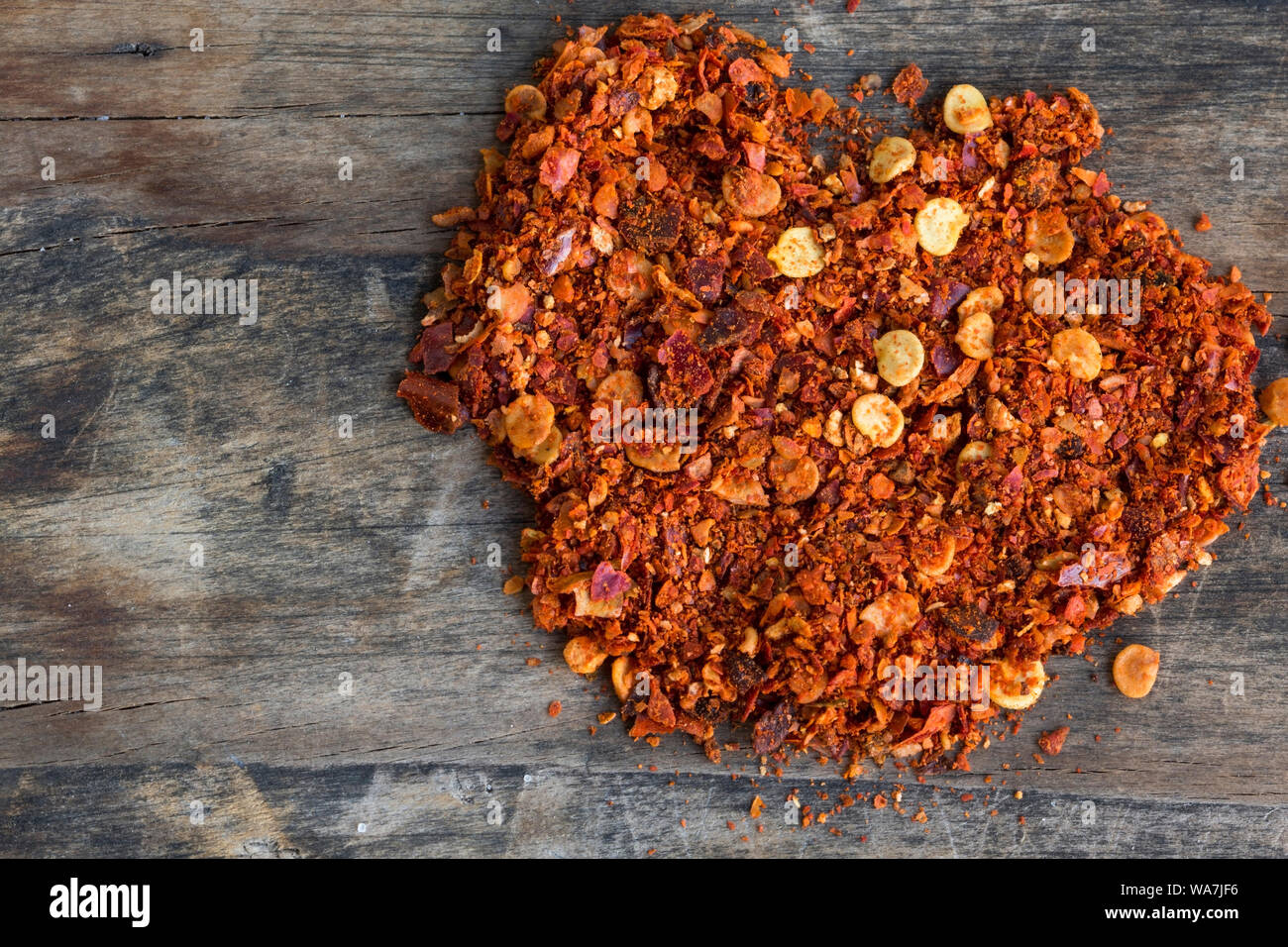Chili Whipped Hot Pepper on a Rustic Wooden Plank Stock Photo - Alamy