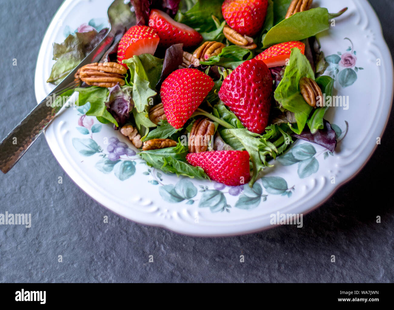 a delicious strawberry pecan salad made with fresh grown produce Stock ...