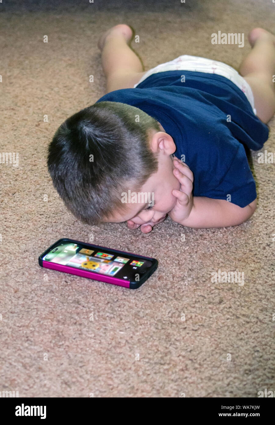 Boy asleep floor hi-res stock photography and images - Alamy