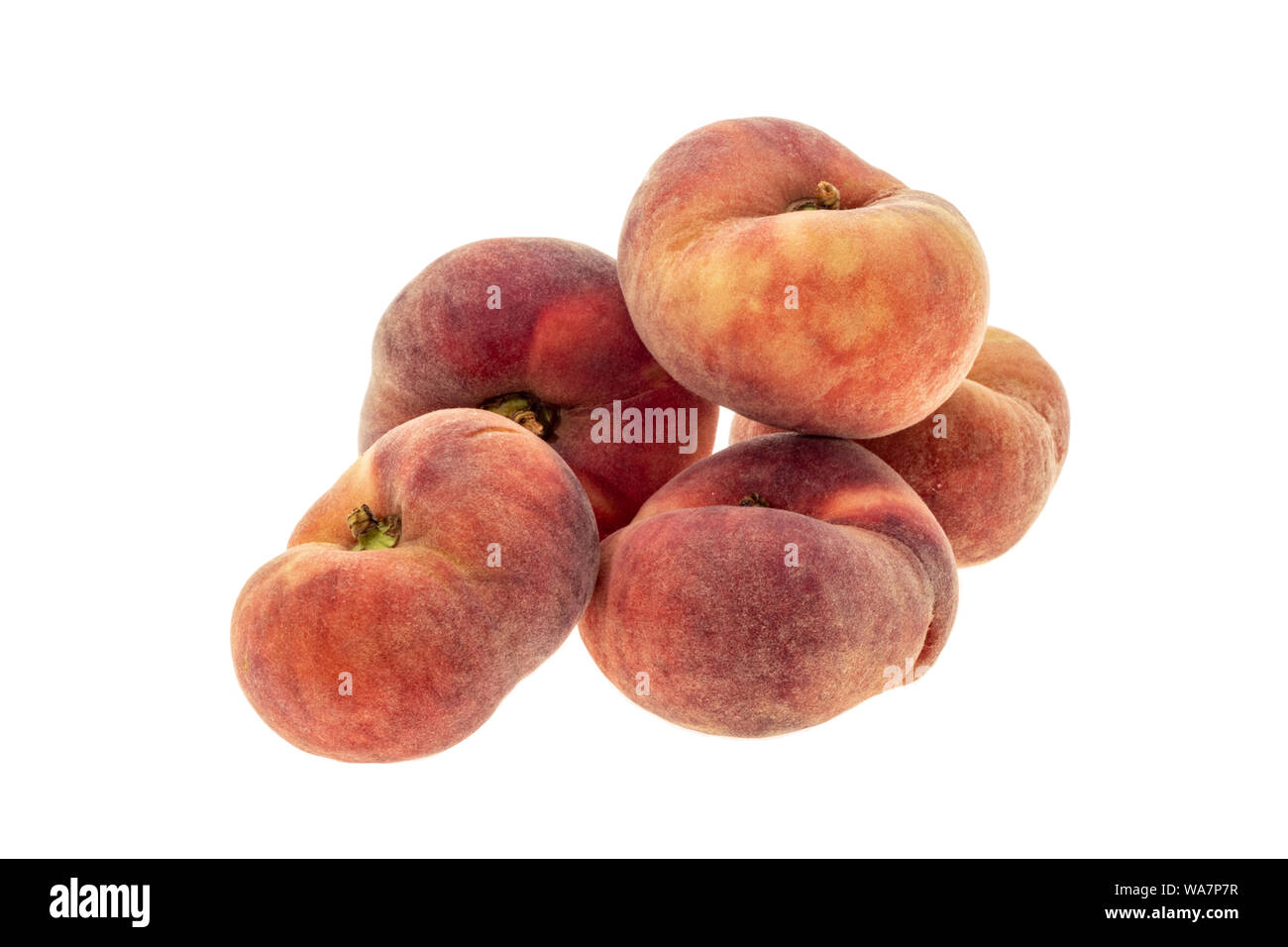 Five flat peaches - white background Stock Photo - Alamy