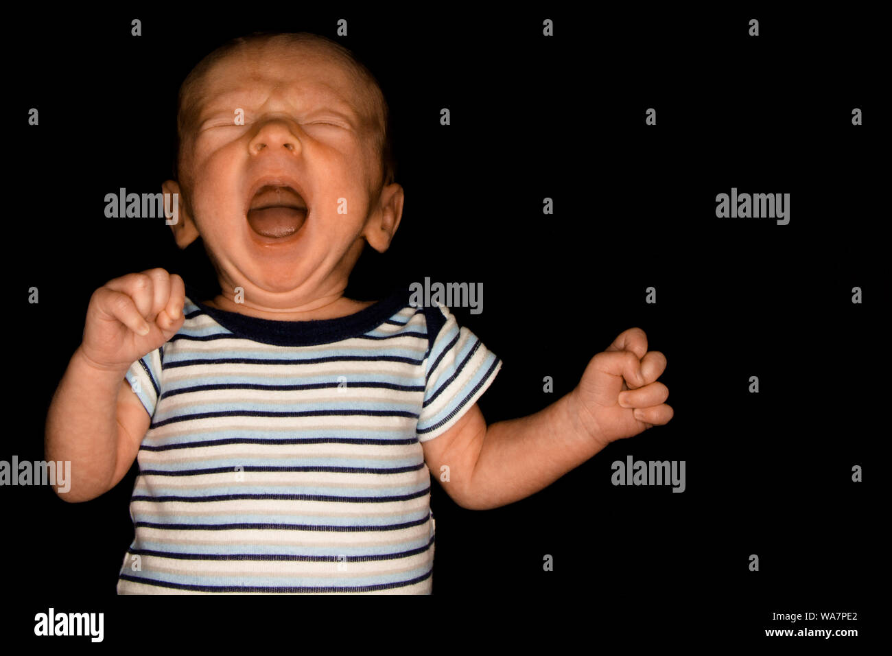 A 3 Week Old Baby Poses on a Black Background. Perfect for Memes with ...