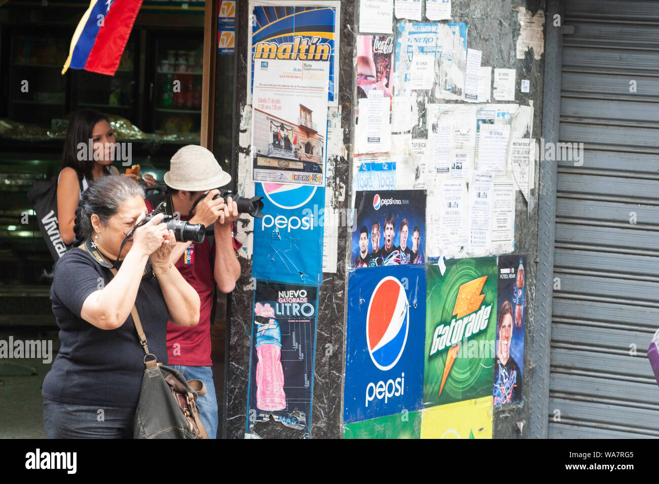 Caracas,Venezuela. Group of photographers taking street photos, in the ...