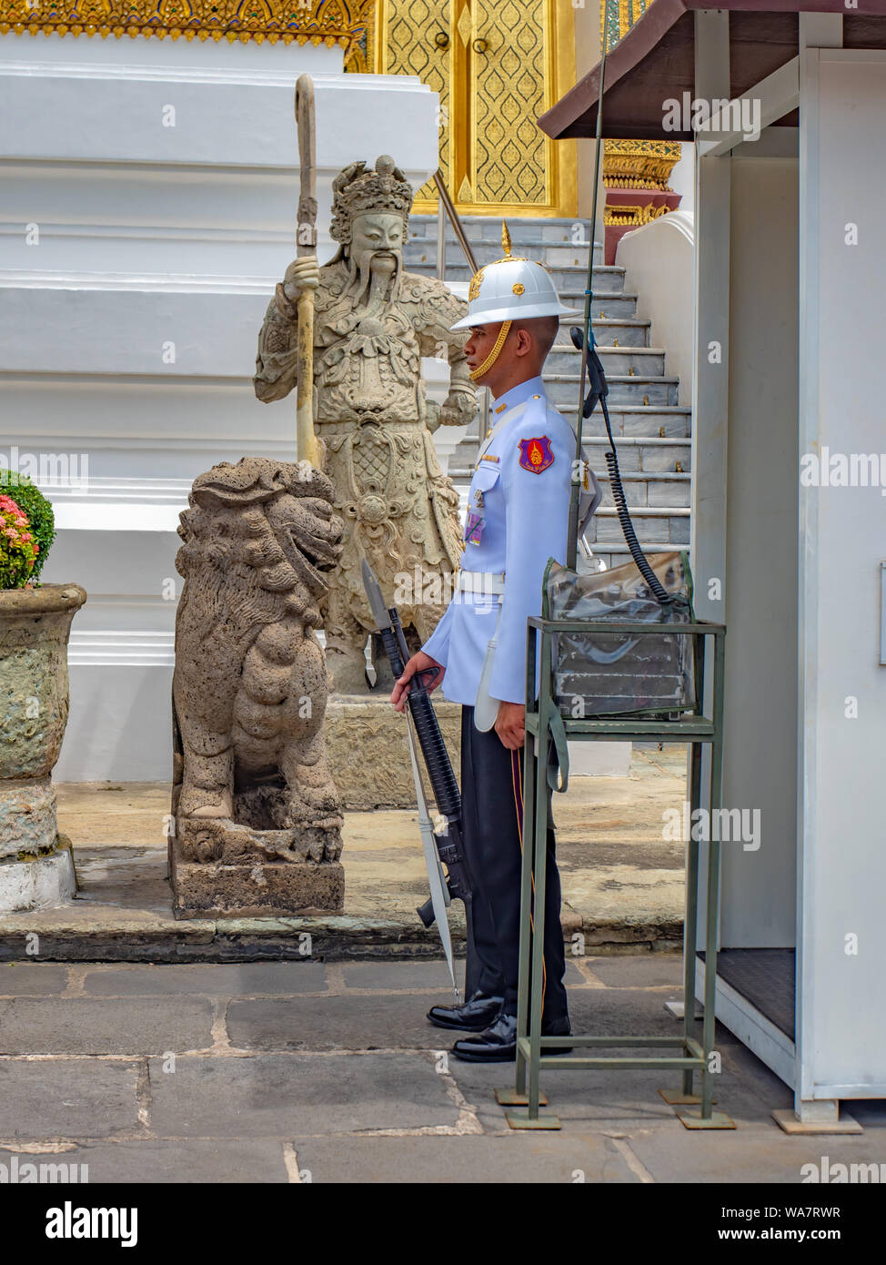 Bangkok, Thailand - July 2019: Unidentified guardian hold rifle in ...