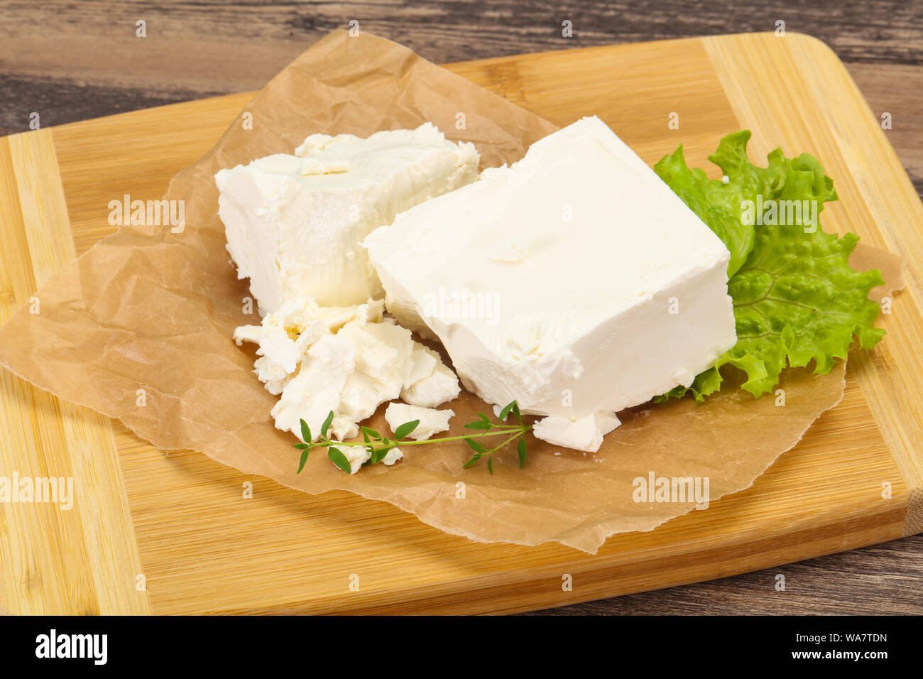 Greek traditional Feta soft cheese in the plate Stock Photo - Alamy