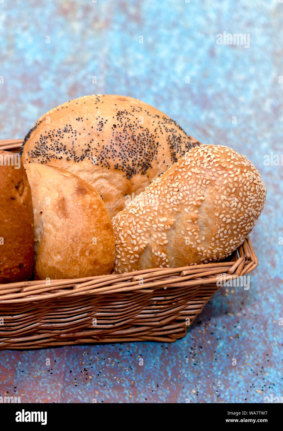Basket of golden bread rolls Stock Photo - Alamy