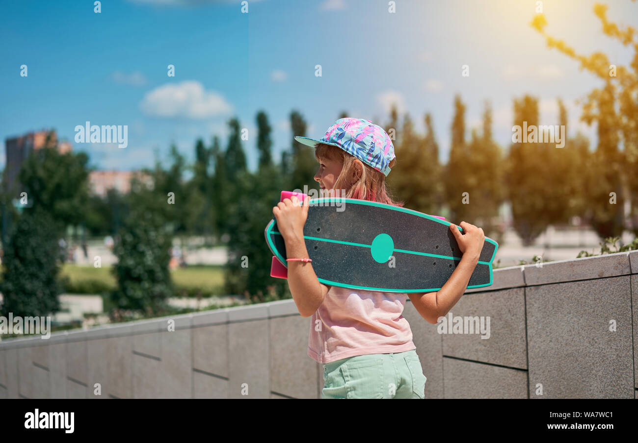 young girl skateboarding in the Park Stock Photo - Alamy
