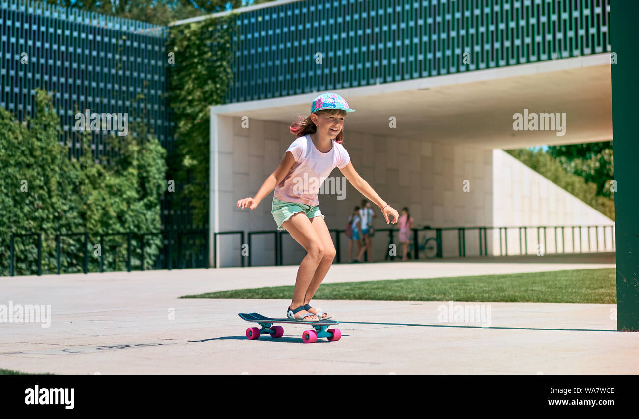 young girl skateboarding in the Park Stock Photo - Alamy