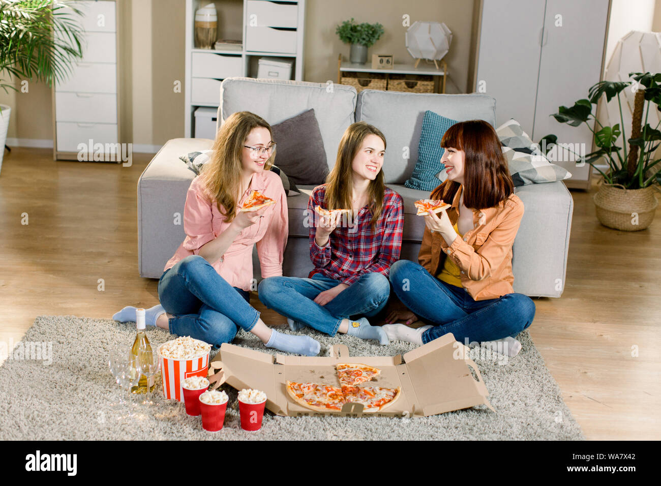 friendship, holidays, fast food and celebration concept - happy young ...