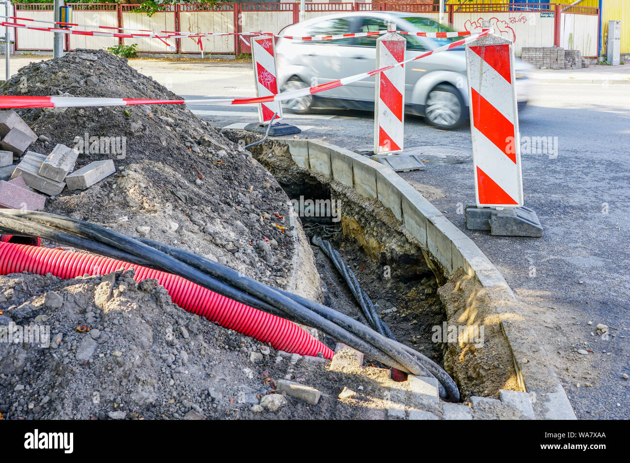underground communications repair and replacement on city street Stock ...