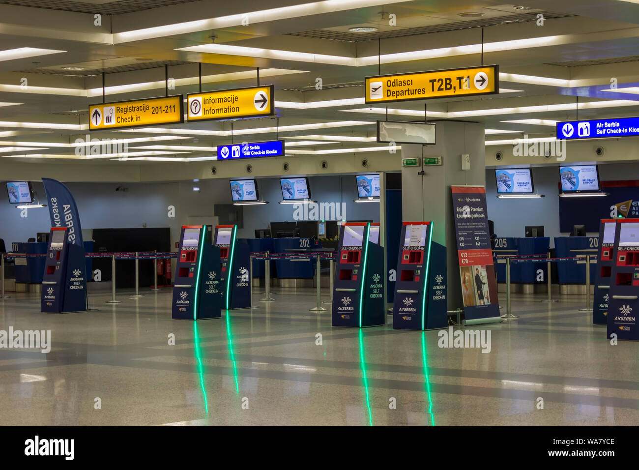 Flight check-in lounge and self check-in machines at the Nikola Tesla ...