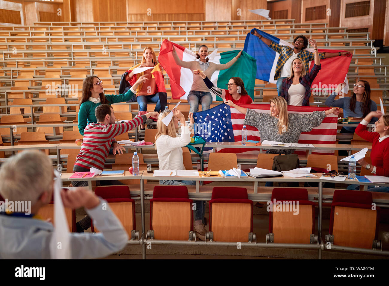 Young students presenting their country with flags in a classroom Stock ...