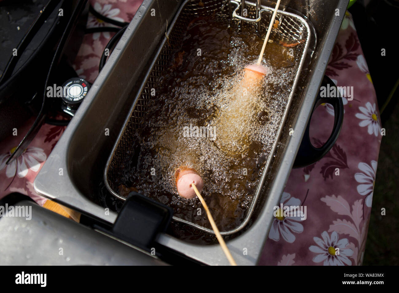 Sausage fryer hi-res stock photography and images - Alamy