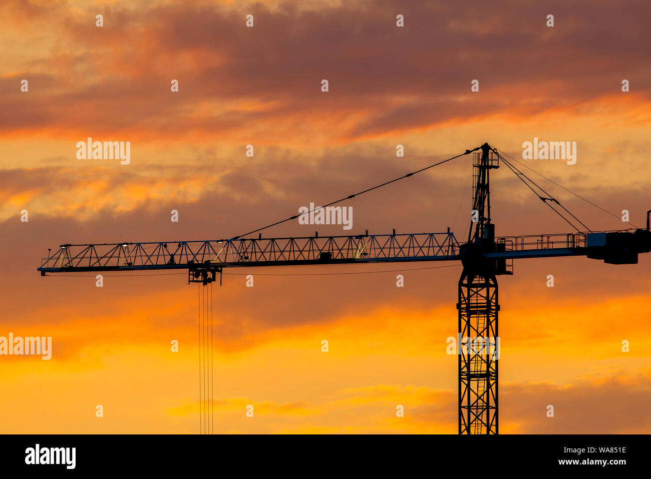 Construction Site of apartment house on sunset Stock Photo - Alamy